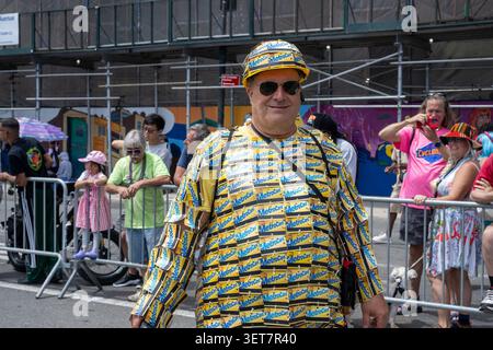 A reveler wearing MTA-themed costume participates in the annual Mermaid ...