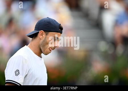 Francisco Cerundolo of Argentina in action against Tommy Paul of ...