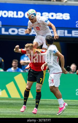 IR Iran' Ali Nemati (19) and Belgium' Kevin De Bruyne (7) seen in ...