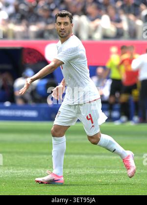 IR Iran' Shoja Khalilzadeh (4) seen in action during the FIFA World Cup ...