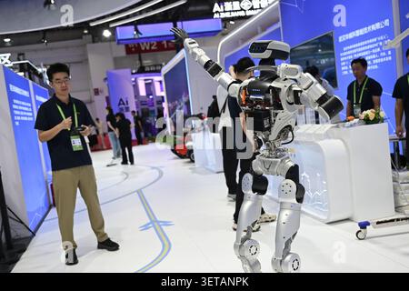 Peking, China. 22nd June, 2026. At an exhibition booth during China's ...