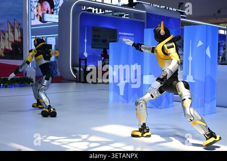 Peking, China. 22nd June, 2026. At an exhibition booth during China's ...