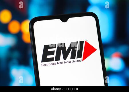 In this photo illustration, the Electronics Mart India (EMI) logo is ...
