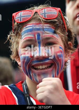 A fan reacts before the World Cup Group K soccer match between Colombia ...