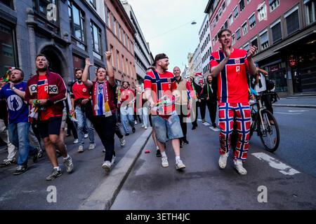 Oslo 20260623. People on their way home from a football party after the ...