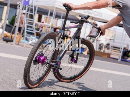 24 June 2026, Hesse, Frankfurt am Main: Two men are jogging along the ...
