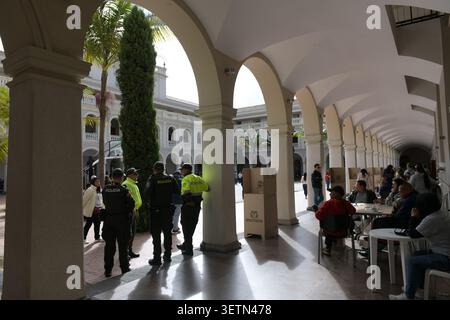 Colombian police guard the electoral process during the runoff election ...