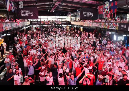 Fans watch a screening of the FIFA World Cup match between England and ...