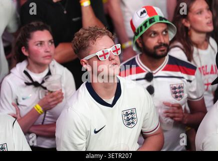 Fans watch a screening of the FIFA World Cup match between England and ...