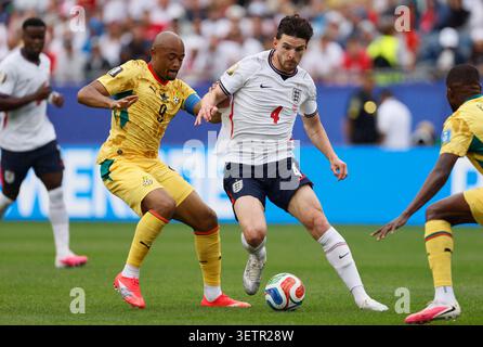 Jordan Ayew Of Ghana And Declan Rice Of England Challenge During The