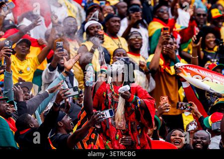 fan of Ghana blows powder during the FIFA World Cup 2026 Group L match ...