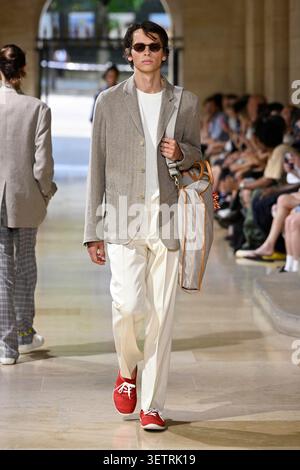 Paris, France. 23rd June, 2026. A model walks the runway the Spring ...