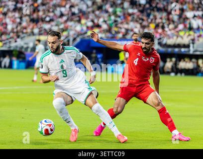 June 22 2026 Algeria defender AÃ¯ssa Mandi (2)looks to pass the ball ...