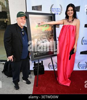 Director Michael Baumgarten, actress Natasha Blasick and musician ...