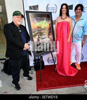 Director Michael Baumgarten, actress Natasha Blasick and musician ...