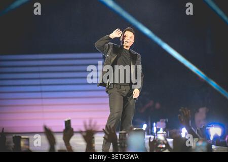 Italian singer Tiziano Ferro, seen performing live on stage at Stadium ...