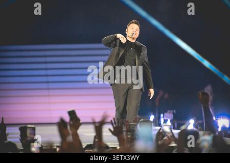 Italian singer Tiziano Ferro, seen performing live on stage at Stadium ...