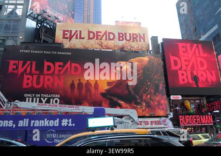 A billboard for the upcoming movie, “Evil Dead Burn,” is seen in Times ...
