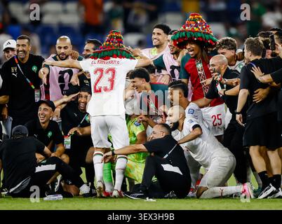 Mexico players celebrate their team victory at the end of the World Cup ...