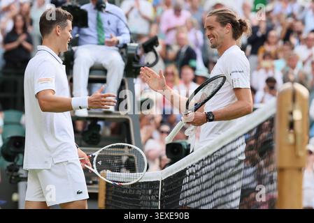 German Alexander Zverev congratulates Belgian Alexander Blockx after ...