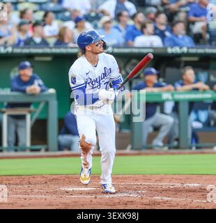 Kansas City Royals shortstop Bobby Witt Jr., left, catches the throw to ...