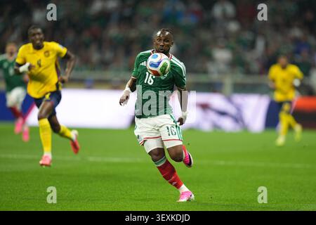 Julian Quiñones #16 of Mexico national team and Joel Ordóñez #4 of ...