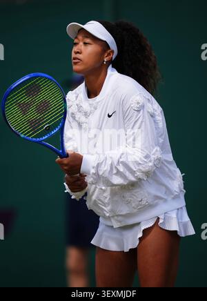 Naomi Osaka of Japan and Anastasia Gasanova of Russia shake hands after ...
