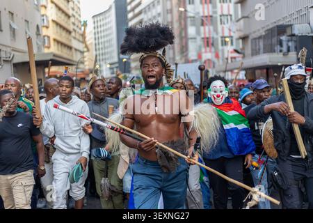 Durban, South Africa. 30th June, 2026. Protesters march during a ...