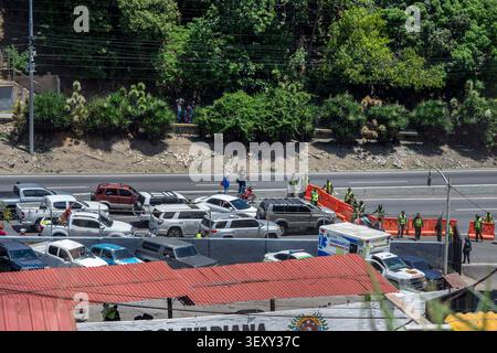 The highway leading to La Guaira is closed by military officials on ...