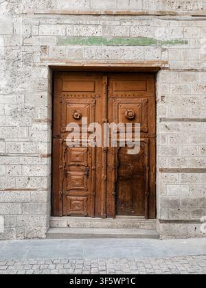Ornate carved wooden door with geometric Islamic patterns at Hazrat ...