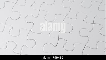 Whole white complete puzzle Stock Photo - Alamy