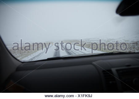 view through car windshield to snow-covered road Stock Photo: 93903671 ...