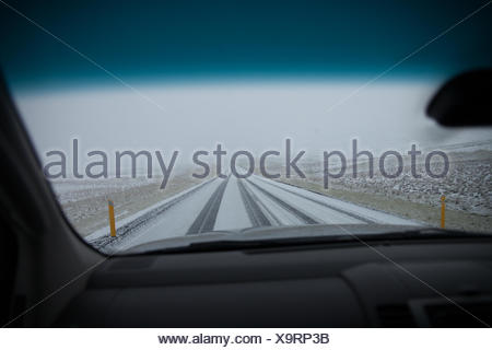 view through car windshield to snow-covered road Stock Photo: 93903671 ...