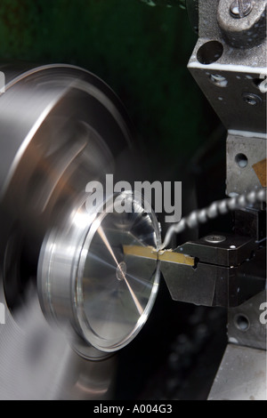 Cutting groove of turning and milling machine on a metal shaft. High ...