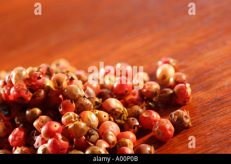 Colorful of pink peppercorns background Stock Photo - Alamy