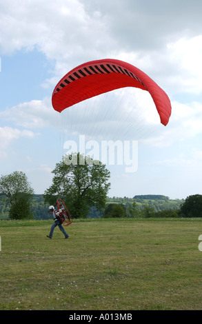 paramotorist taking off Stock Photo - Alamy