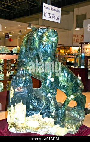 Jade craftsman at work in the Beijing Dragon Land factory in Beijing ...