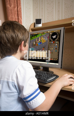 10 year old white boy making muscles by pool Stock Photo - Alamy