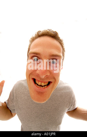man with manic grin Stock Photo - Alamy