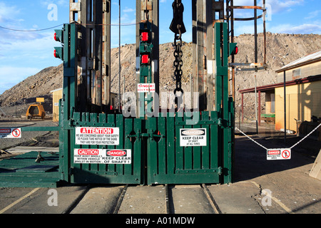 Mine Shaft detail of two cage access into underground mine, on top of ...