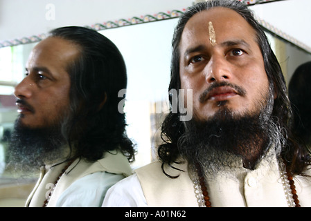 Indian priest sadhu with long hair and beard in meditation Pune ...