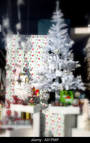 Christmas tree in the shop window. Christmas discount concept Stock ...