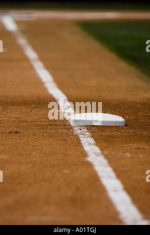 Foul line and base Stock Photo - Alamy
