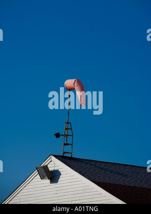 Windsock on top of a building Stock Photo - Alamy