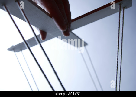 Hand on puppet strings Stock Photo: 3216997 - Alamy