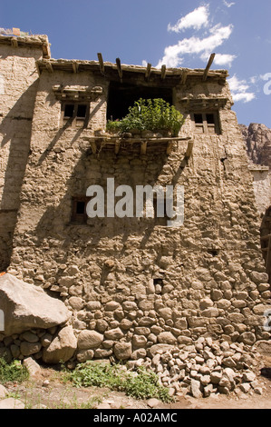 A traditional stone and clay big Ladakhi house in Dha Hanu village ...