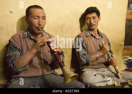 Ladakhi man playing traditional music instrument Surma trumpet Ladakh ...