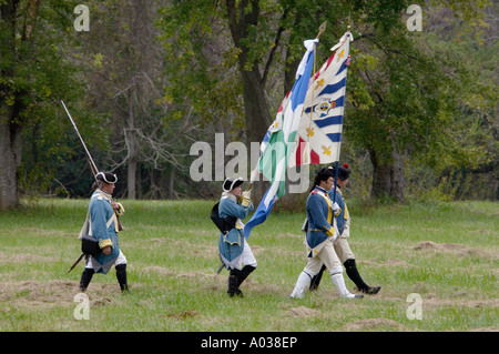 French army reenactors march to the surrender ceremony at Yorktown ...