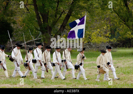 French army reenactors march to the surrender ceremony at Yorktown ...