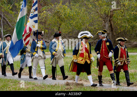 French army reenactors march to the surrender ceremony at Yorktown ...